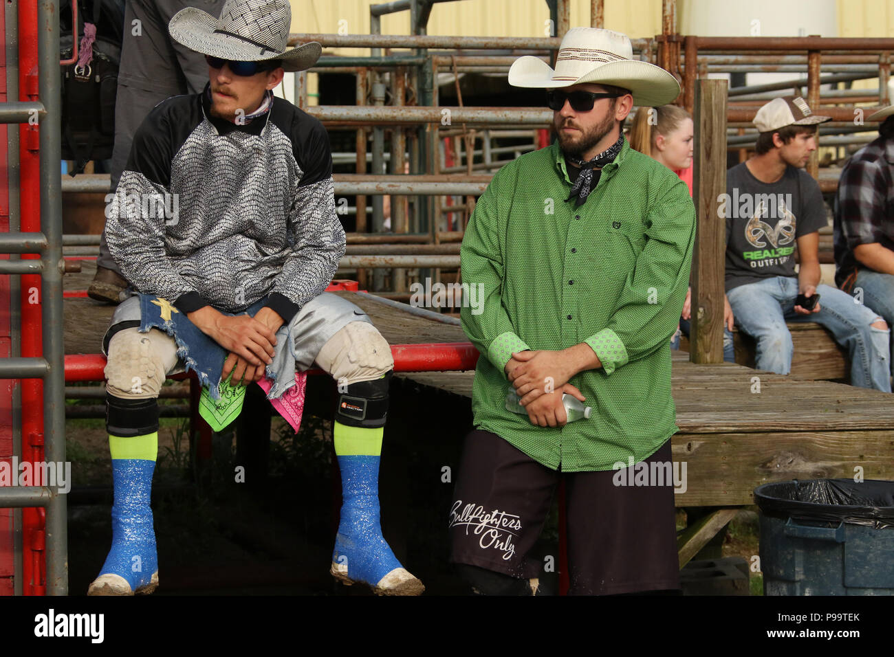 Rodeo clowns await the event. Small town weekly Bull Riding as a sport ...