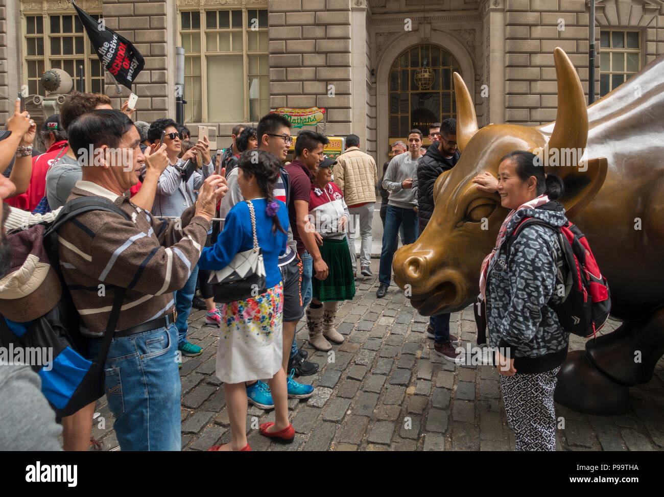 Wall street charging bull american flags hi-res stock photography and ...
