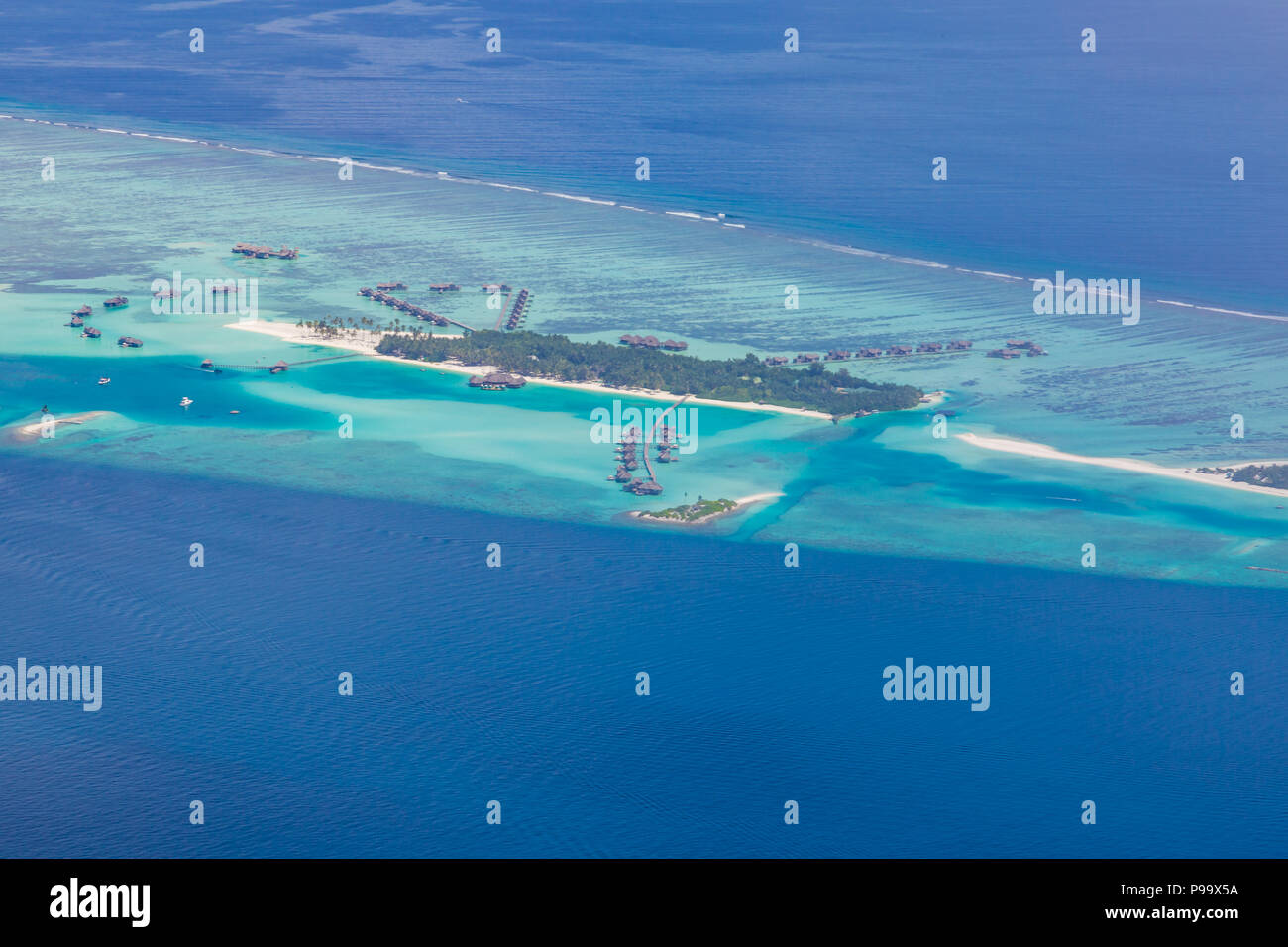 Amazing aerial view of Maldives island and beach. Drone or airplane ...