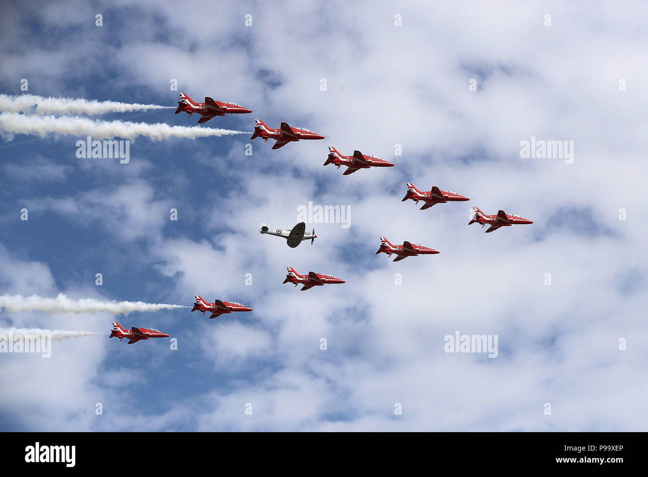 The Red Arrows fly in formation around another aeroplane Prime Minister ...