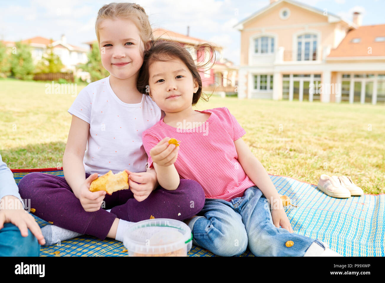 Girls Enjoying Picnic Outdoors Stock Photo - Alamy