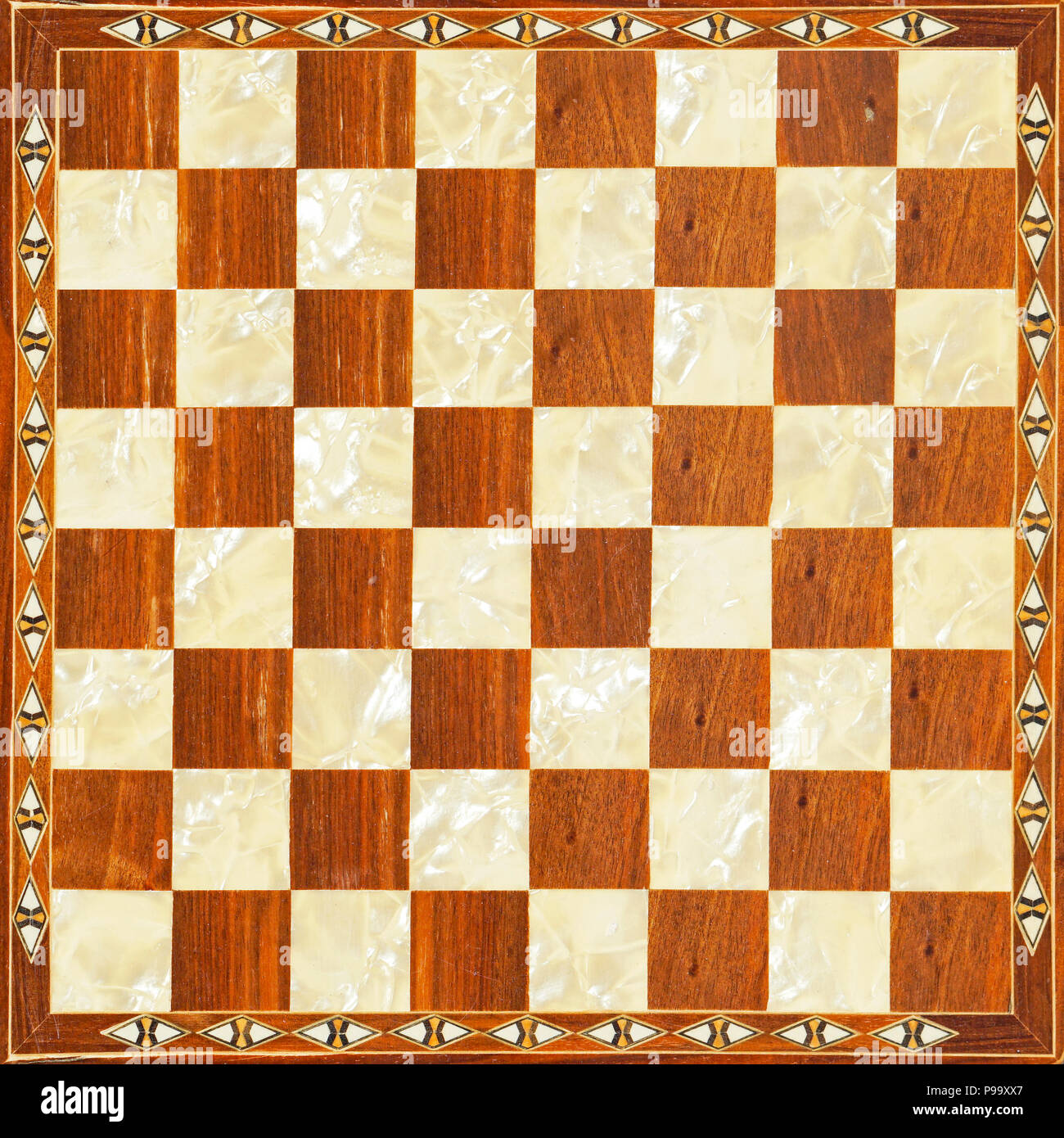 Luxury carved in wood checkered chess board Stock Photo - Alamy