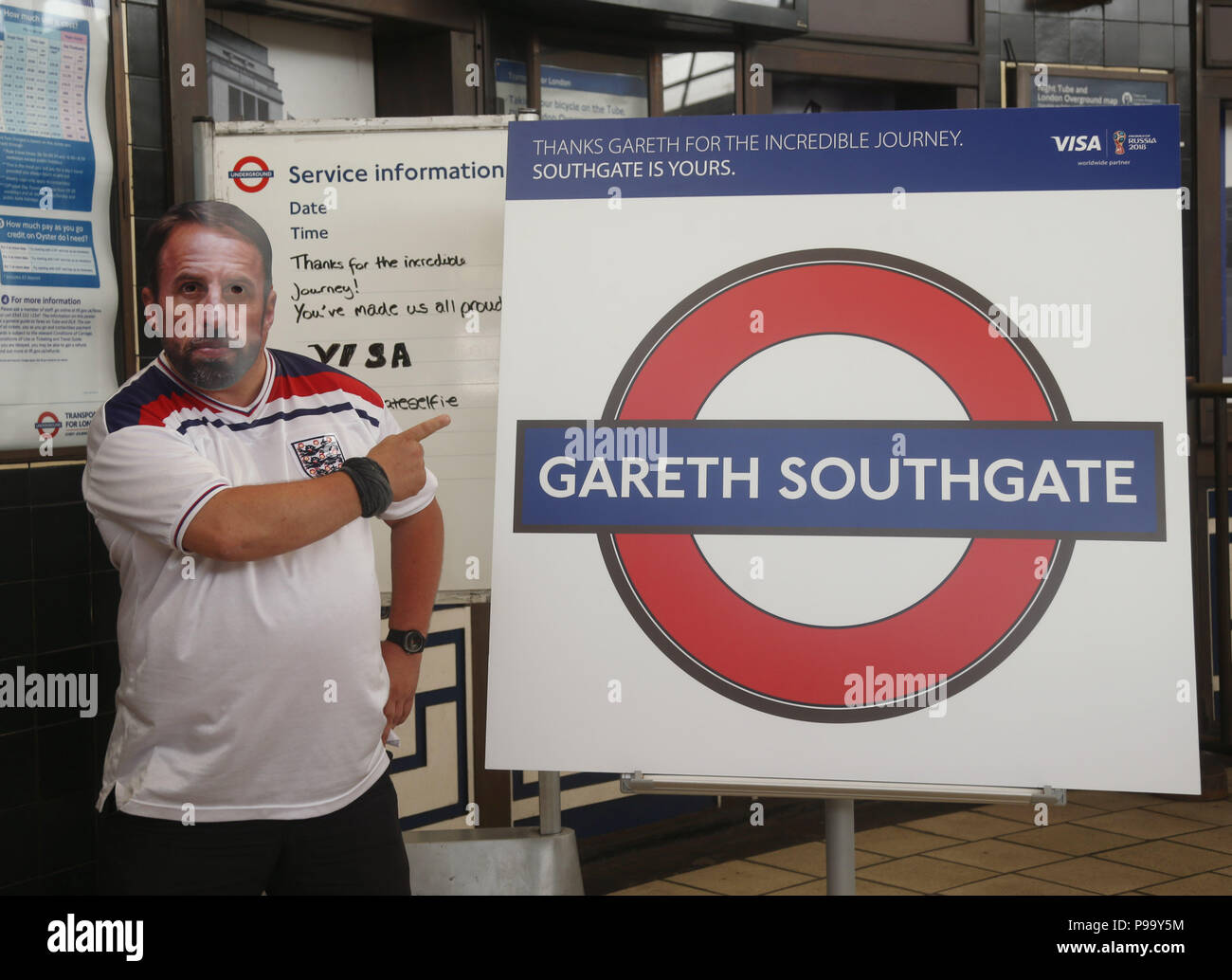 Ian Eardley from Stoke-on-Trent poses next to a sign at Southgate Tube ...