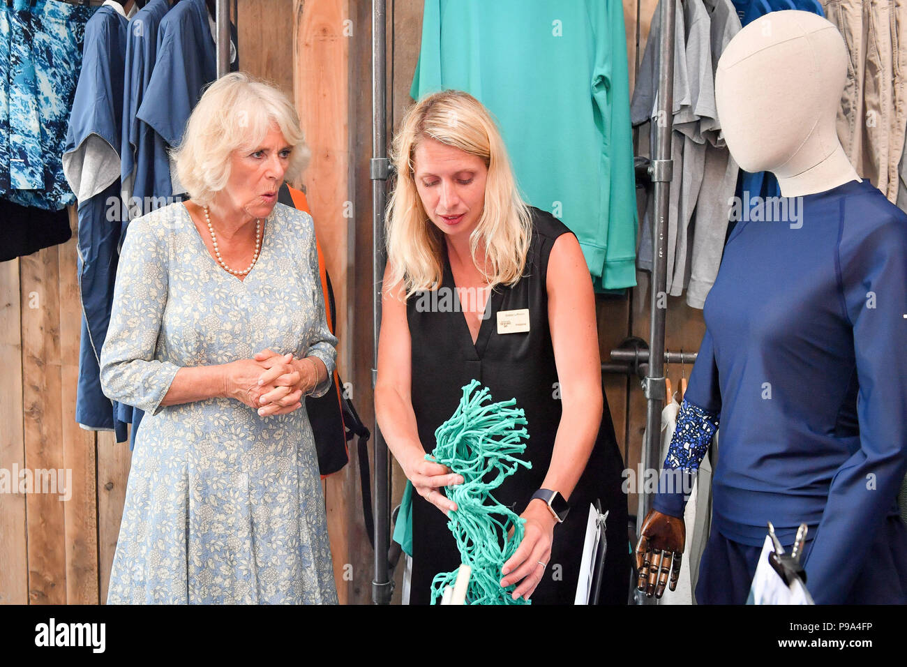 The Duchess of Cornwall (left) is shown sustainable clothing by Debbie ...