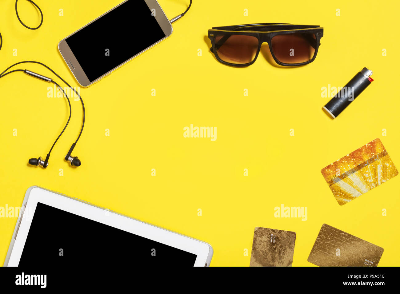 set of modern people devices on a yellow background Stock Photo - Alamy