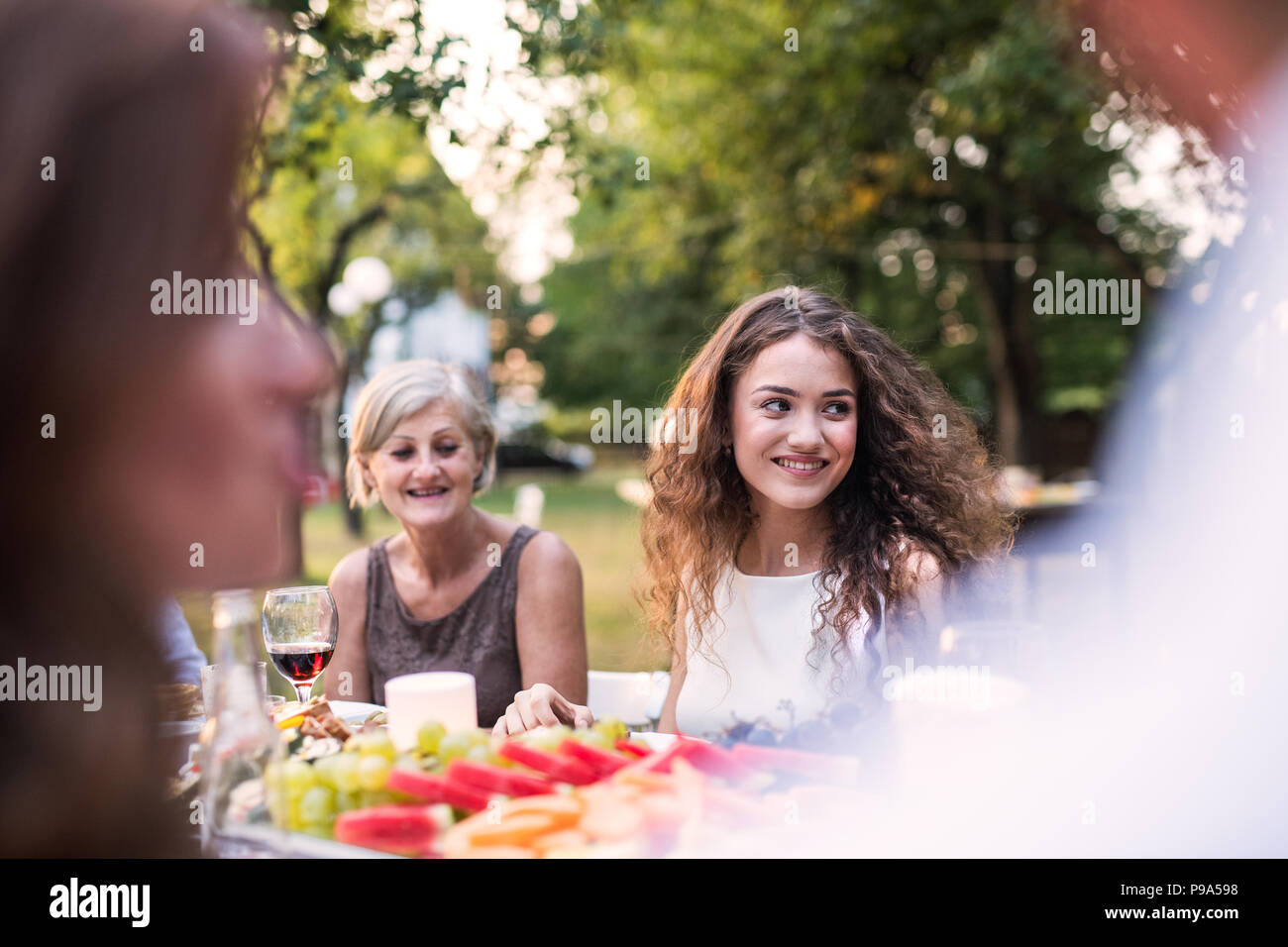 Family celebration or a garden party outside in the backyard Stock ...