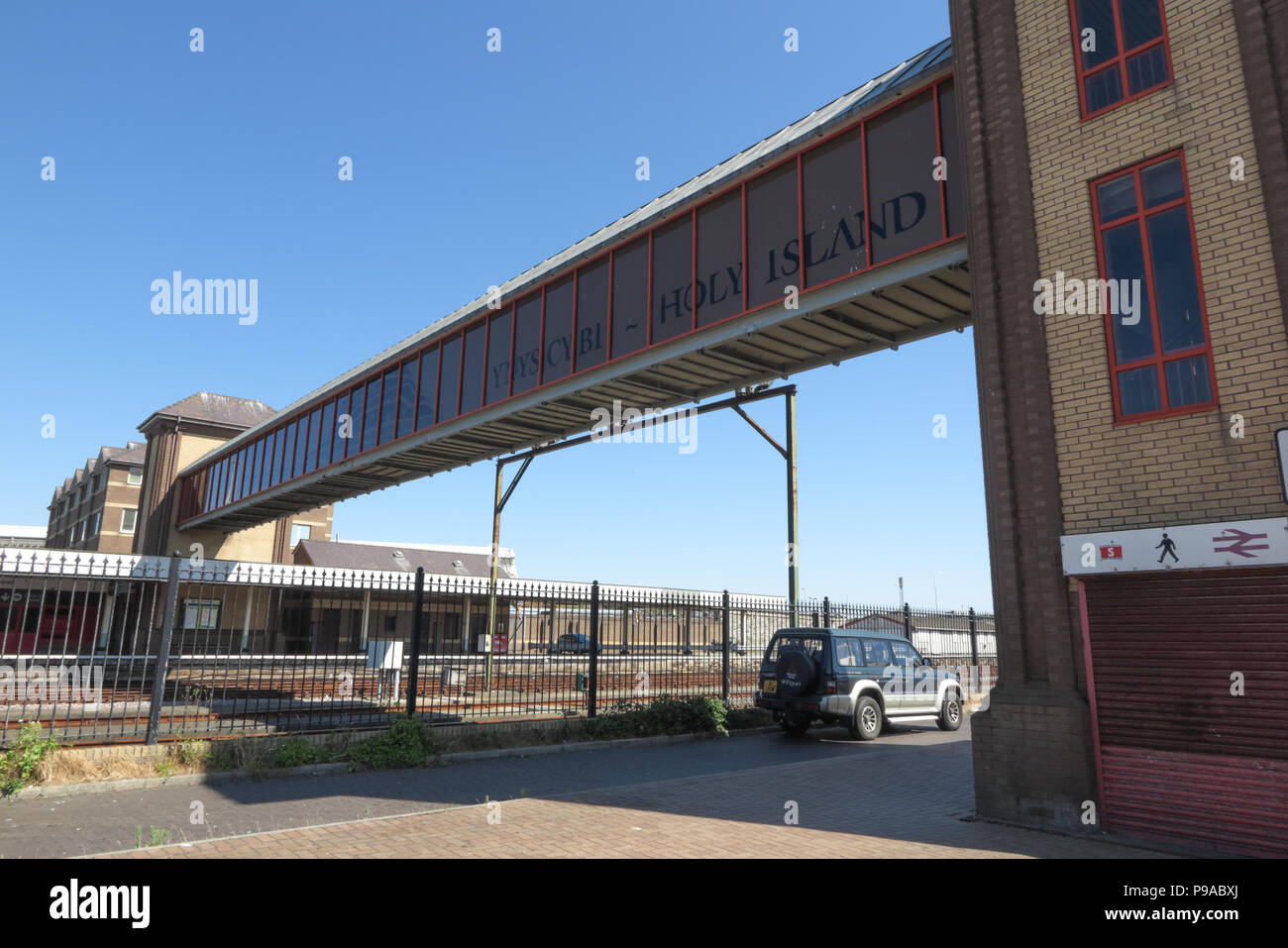 Pedestrian bridge to railway station, Holyhead, Anglesey Stock Photo ...