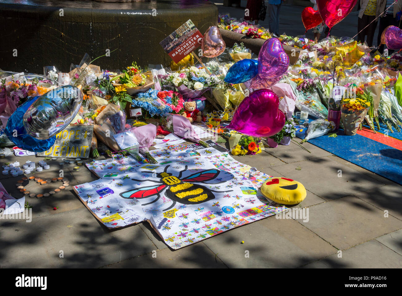 Flowers, balloons and bee tributes to the victims on the anniversary of ...
