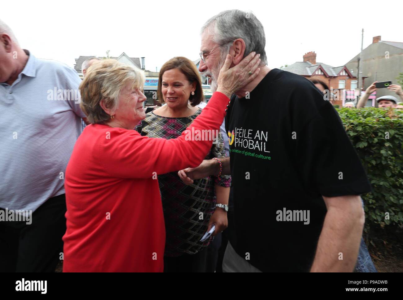 Sinn Fein President Mary Lou McDonald TD (centre) looks on as a ...