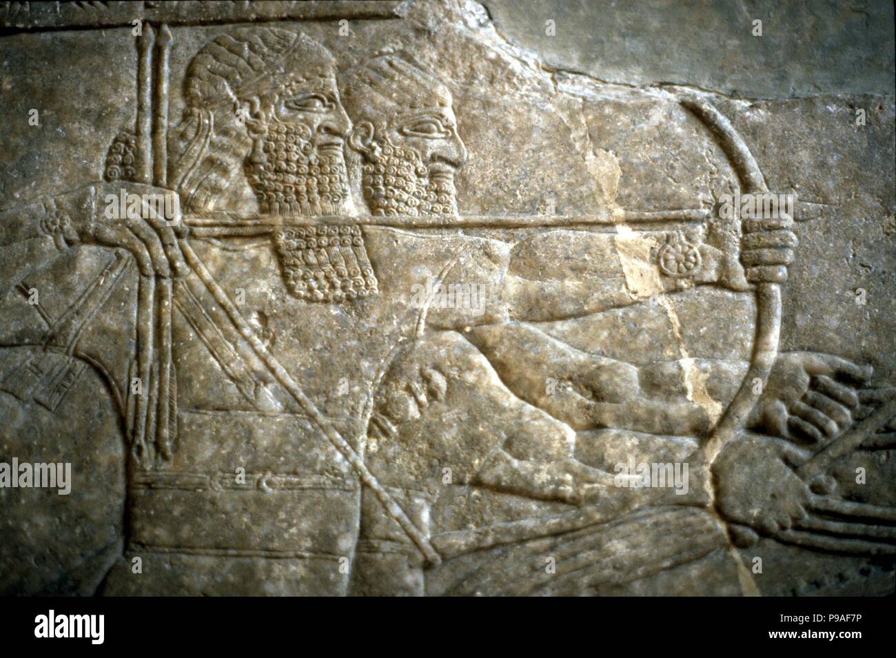 King Ashurnasirpal II during a royal lion hunt. Museum: State Hermitage ...
