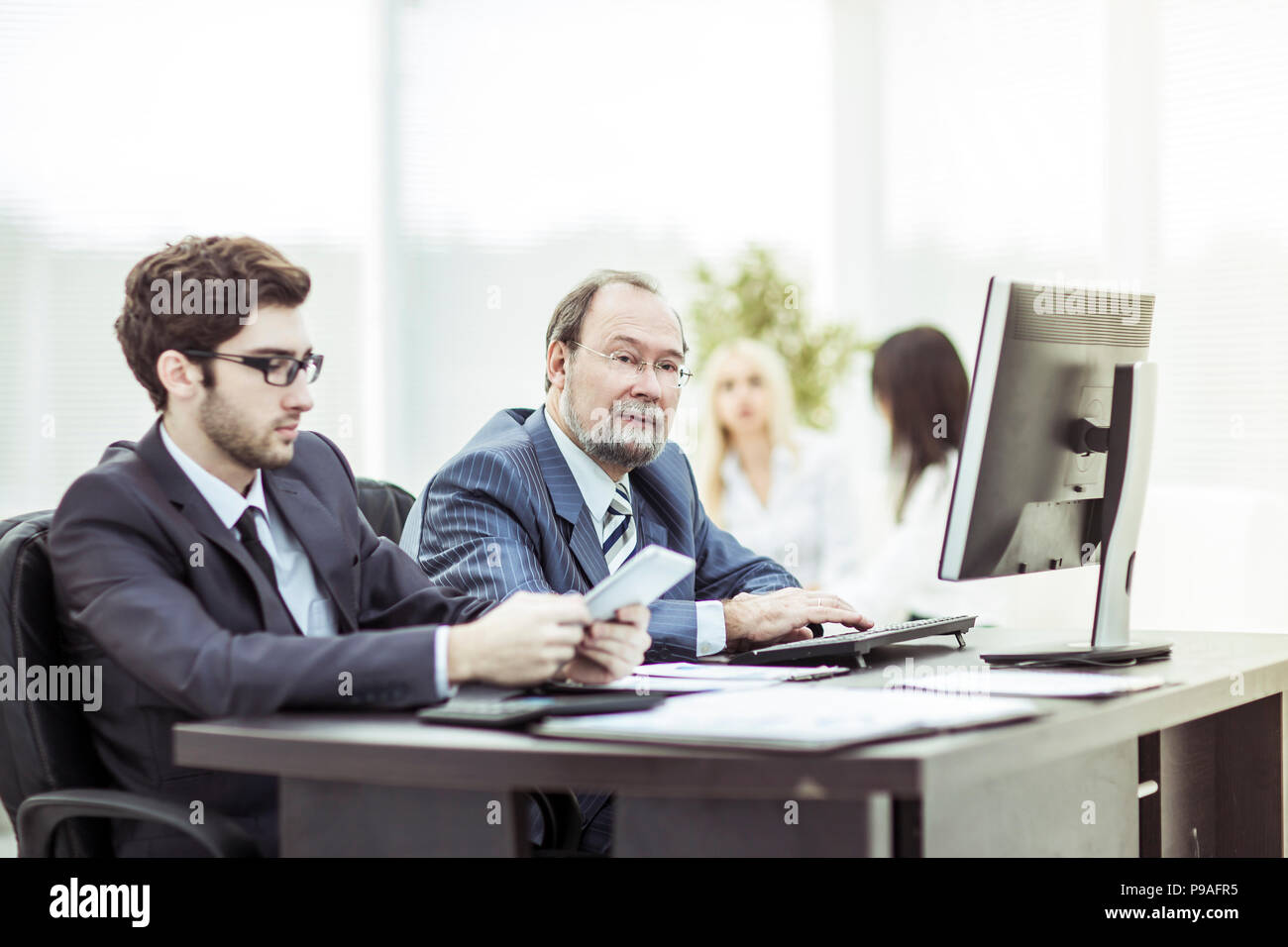 Workgroup employees hi-res stock photography and images - Alamy