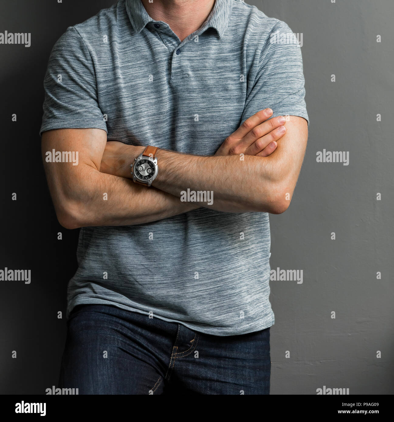 Man collared shirt arms folded hi-res stock photography and images - Alamy