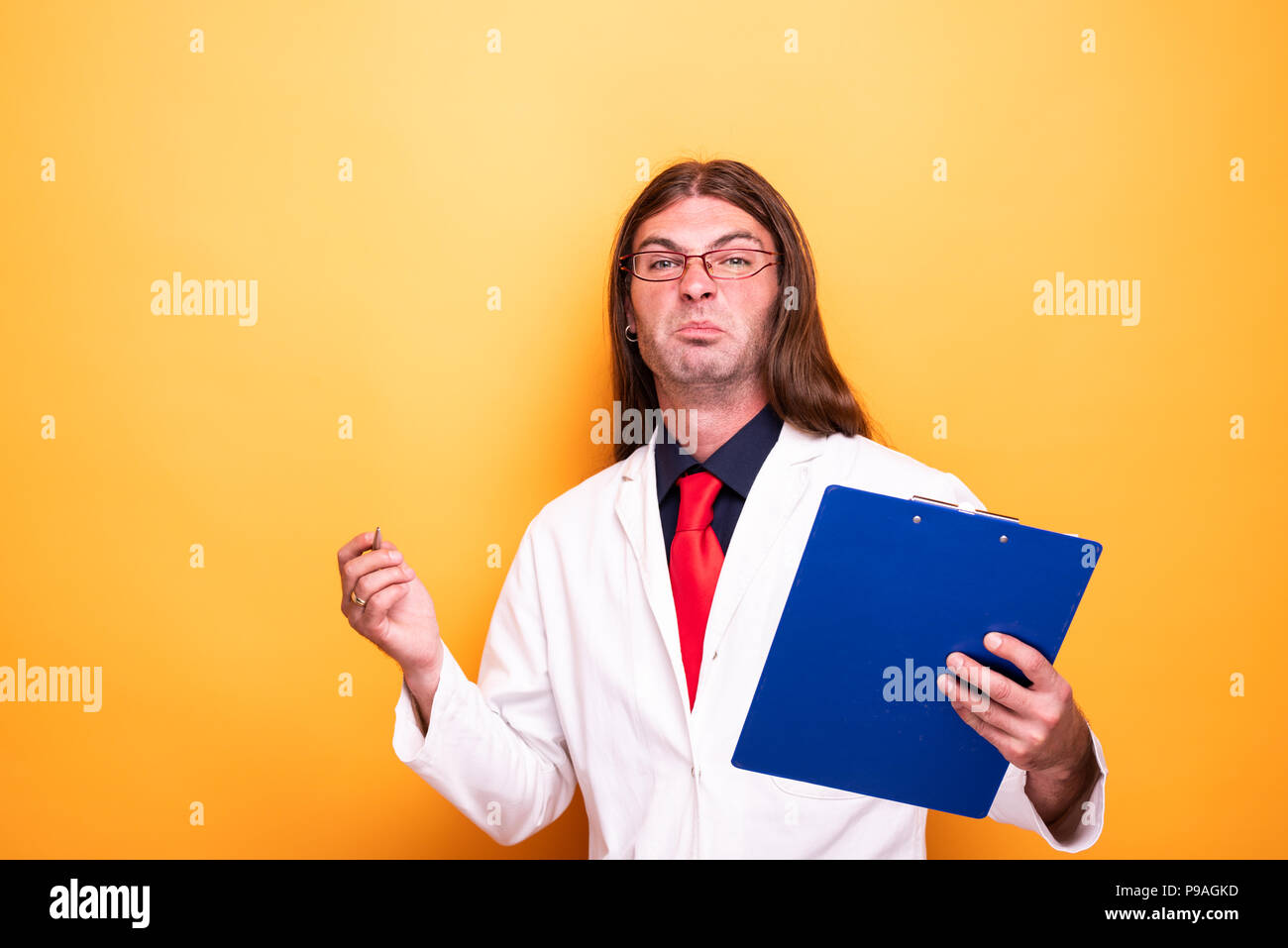 Angry funny face of male doctor Stock Photo - Alamy