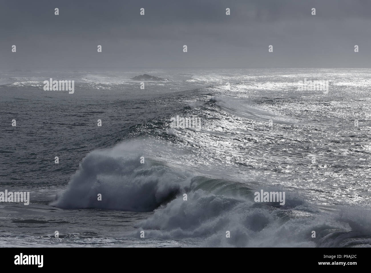 Autumn Atlantic wave in a dark sparkling sea Stock Photo - Alamy