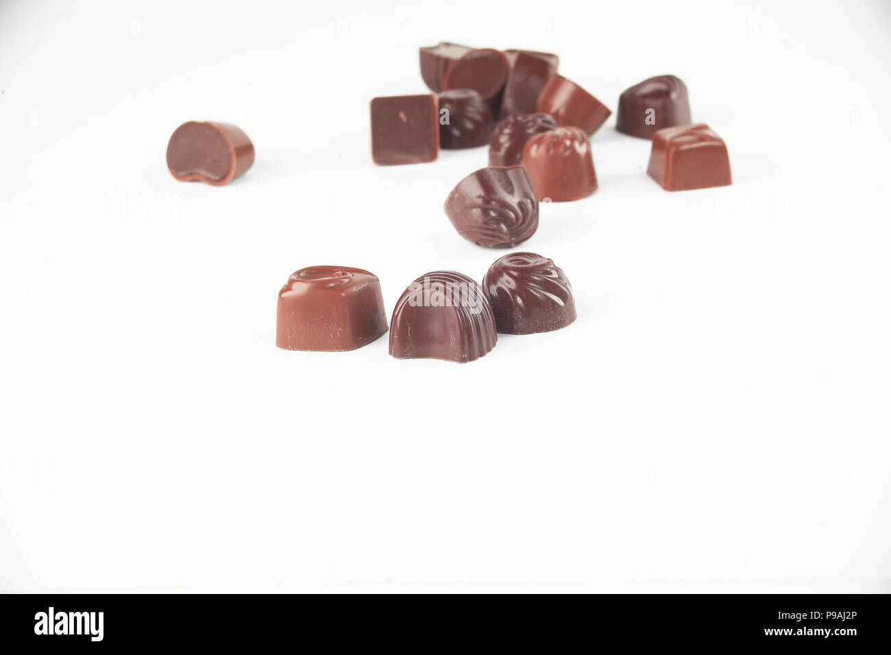 close up. chocolate sweets. isolated on white.photo with copy space ...