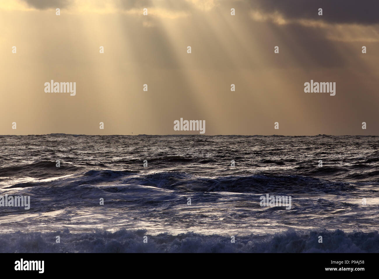 God rays over black hi-res stock photography and images - Alamy