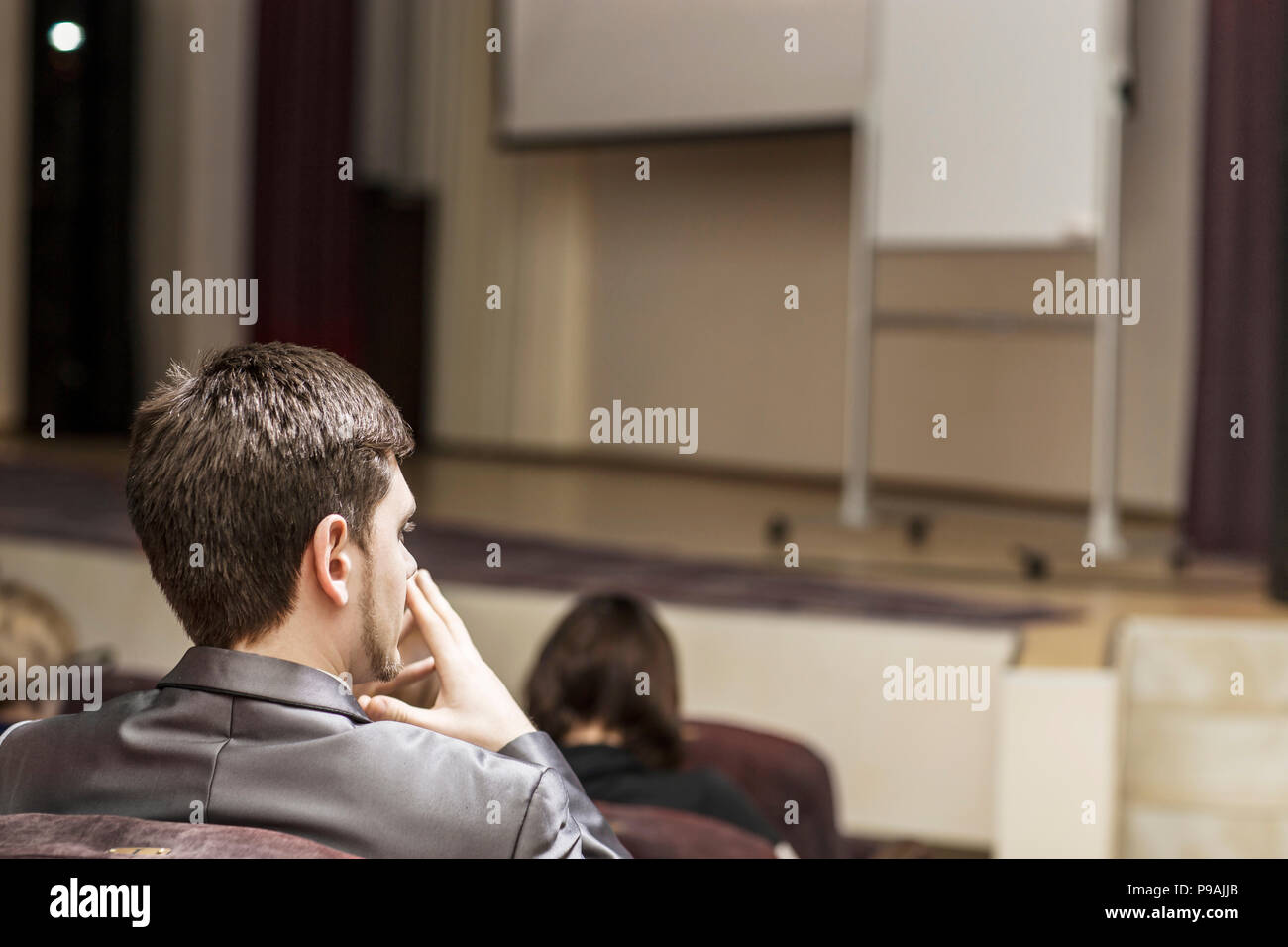 students of business courses sitting in the conference room for a ...