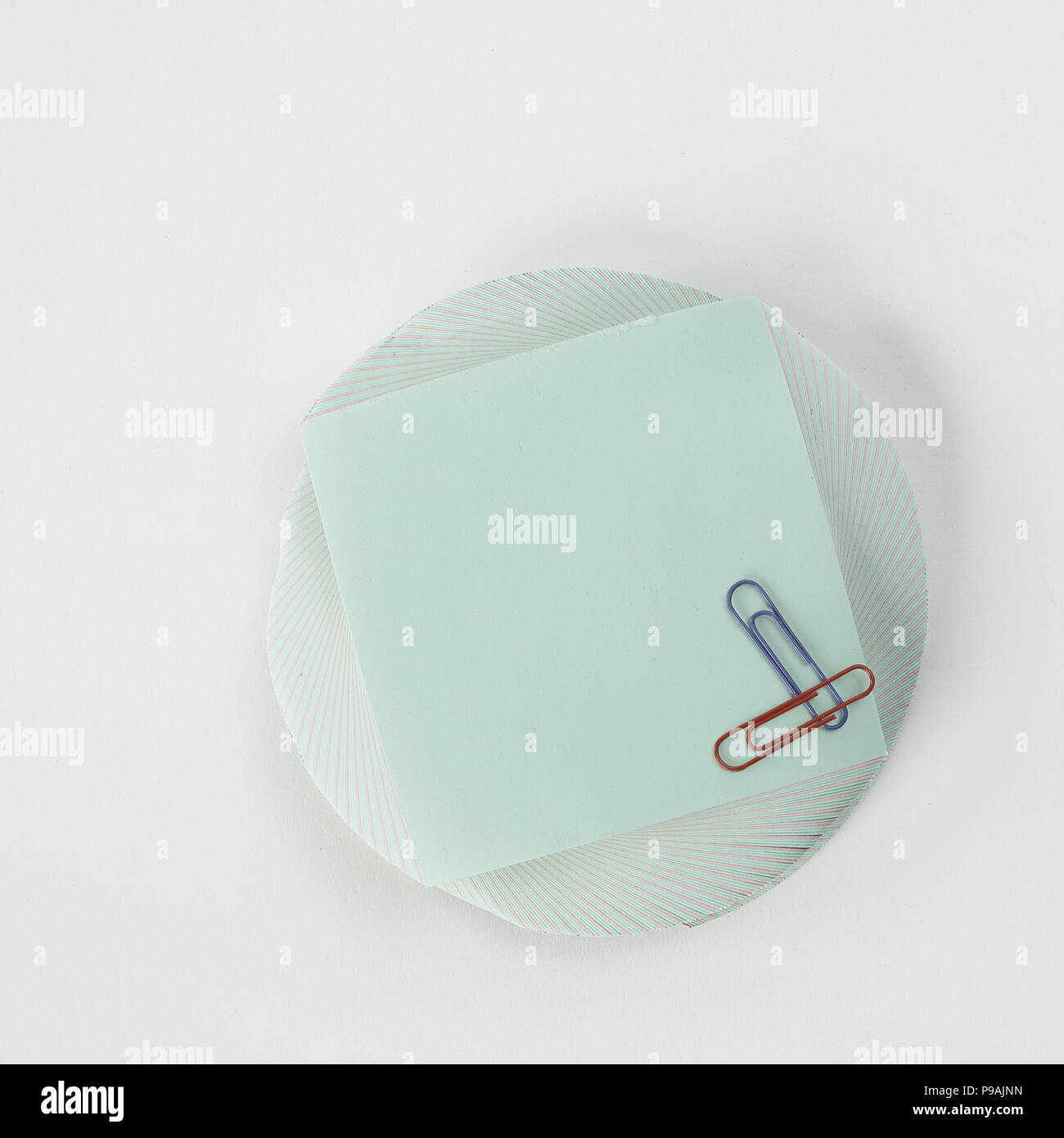 blank sheet for notes and paper clip isolated on white background Stock ...