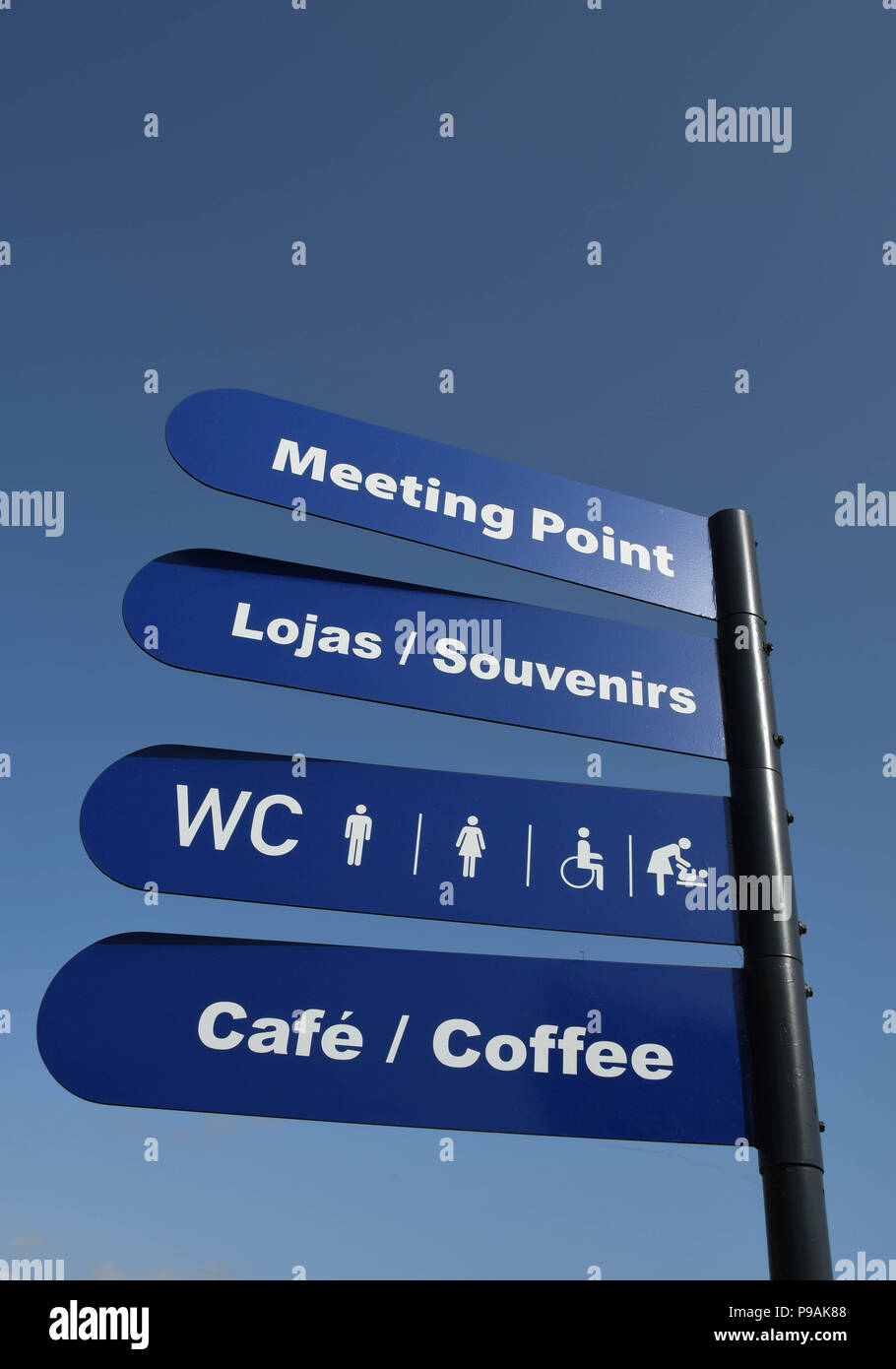 Tourist information sign against a deep blue sky in Funchal, Madeira ...