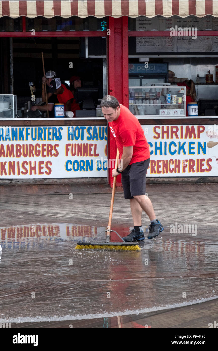 Worker sweeping hi-res stock photography and images - Alamy