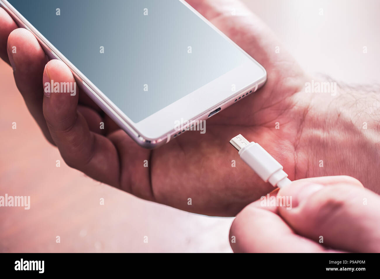 Plugging in a me plug hi-res stock photography and images - Alamy