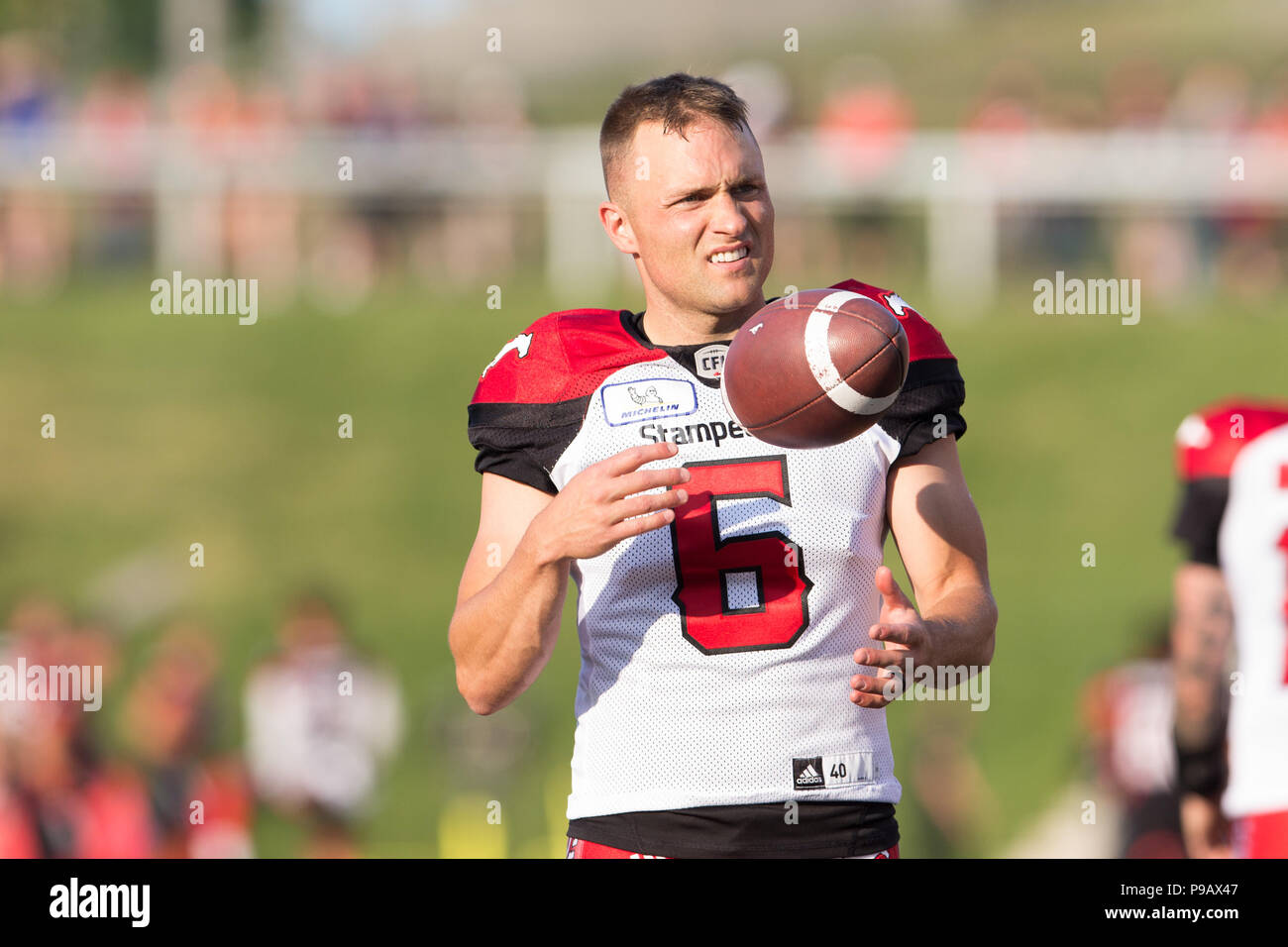 Ottawa, Canada. 12th July, 2018. Calgary Stampeders punter Rob Maver (6 ...