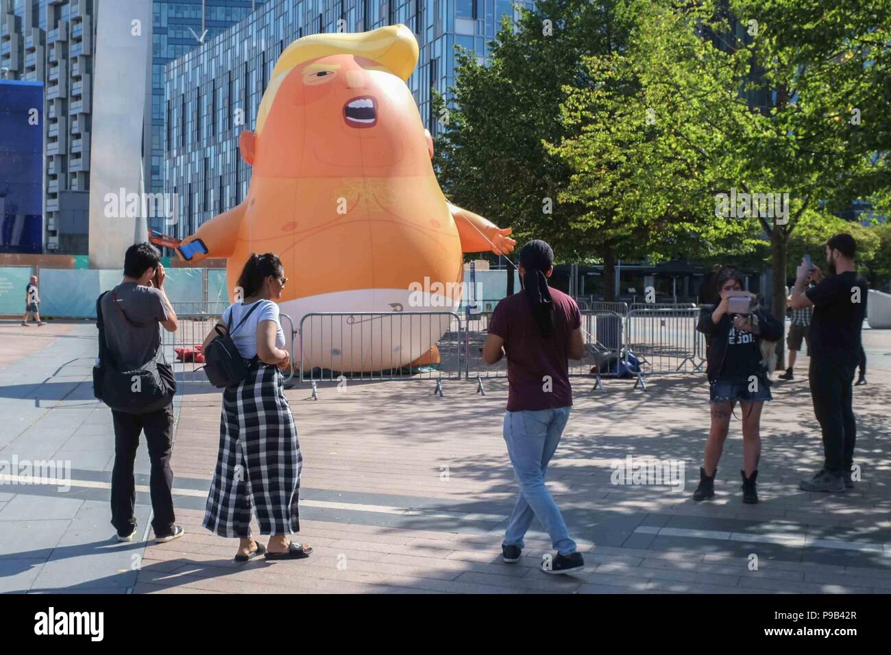 London, UK. 17th July 2018: People take photos of the 6 metre high ...