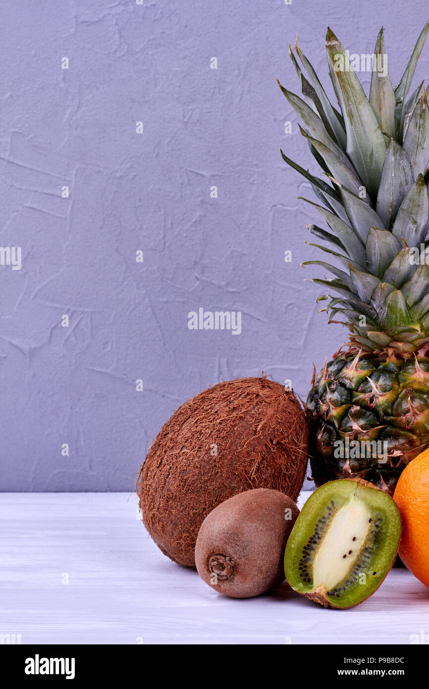 Healthy tropical fruits and copy space. Composition with fresh exotic ...