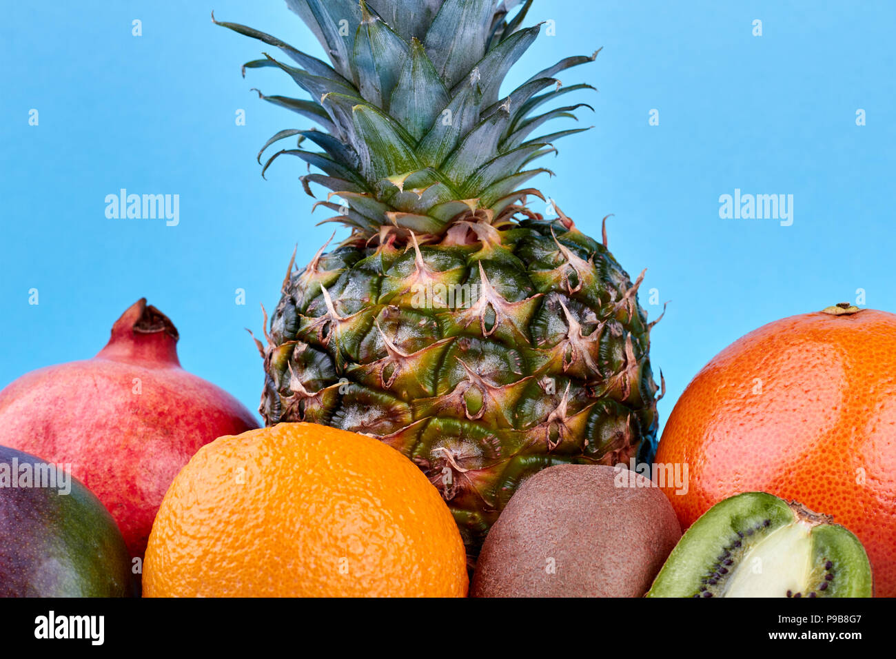 Assorted tropical fruits close up. Variety of colorful tropical fruits ...