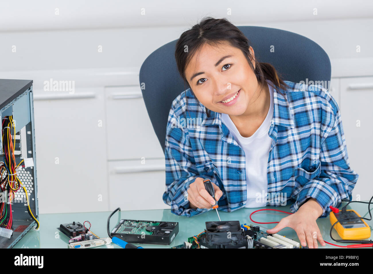 female computer repairer Stock Photo - Alamy