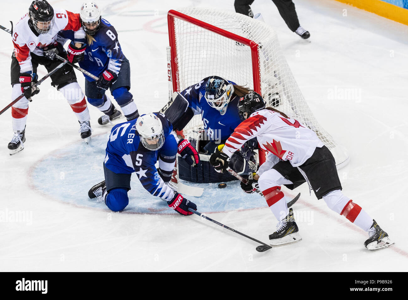 Blayre Turnbull (CAN), Maddie Rooney USA goalie and Megan Keller (USA ...