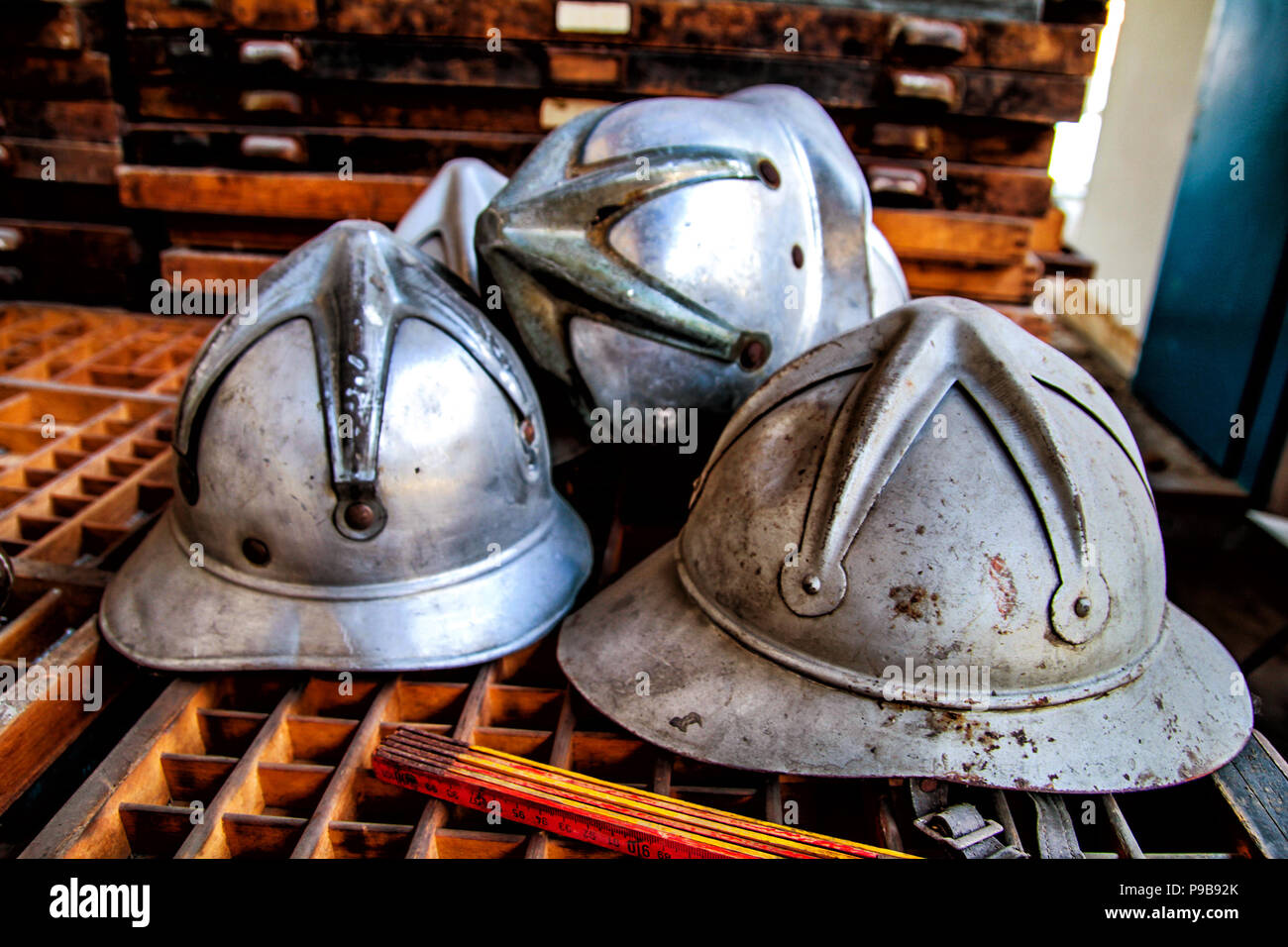 Old fire helmets hi-res stock photography and images - Alamy