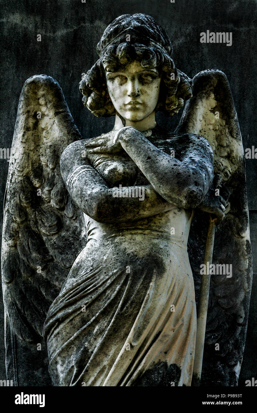 Roman stone statue of an angel with wings and motives Stock Photo - Alamy