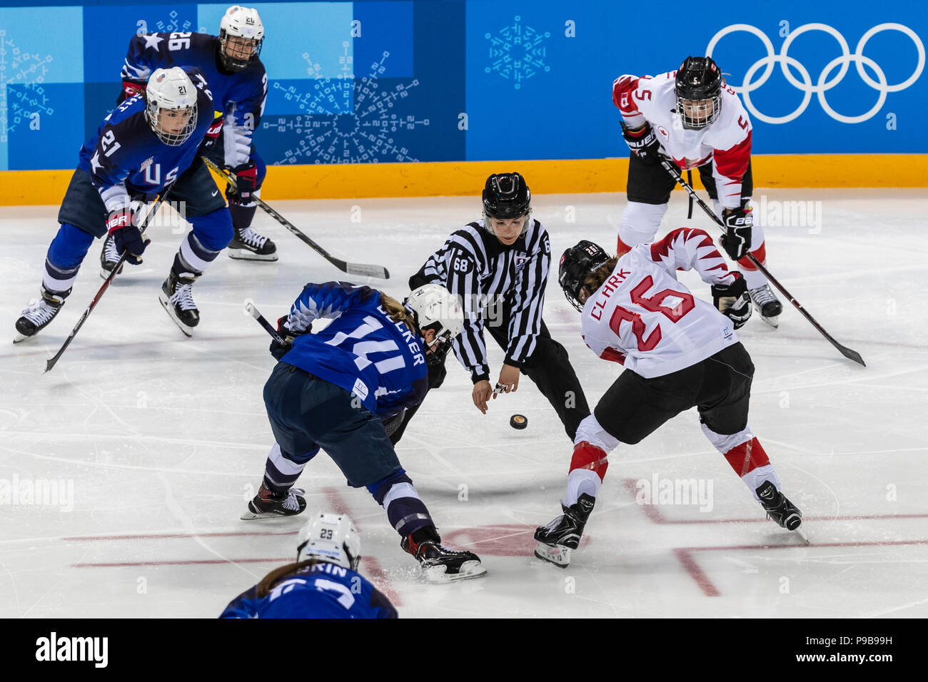Brianna Decker (USA) and Emily Clark (CAN) face off during the Gold ...