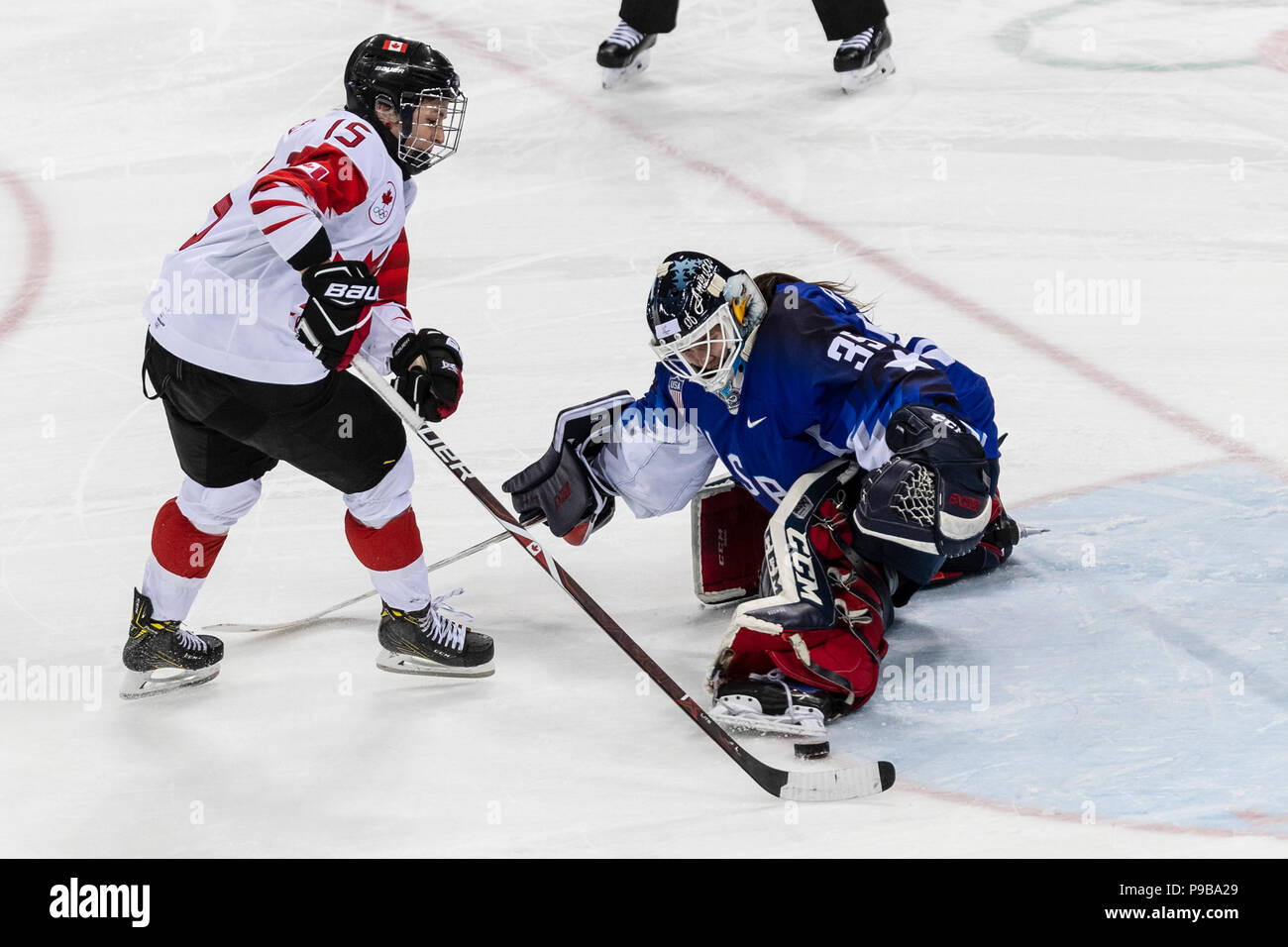 Goalie Maddie Rooney (USA) and Mélodie Daoust (CAN) during the Gold ...