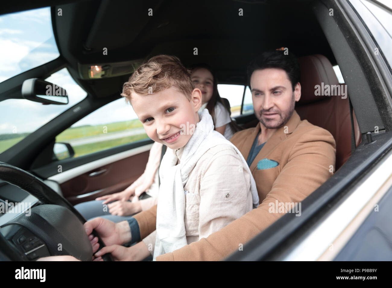 father and son driving a car Stock Photo - Alamy