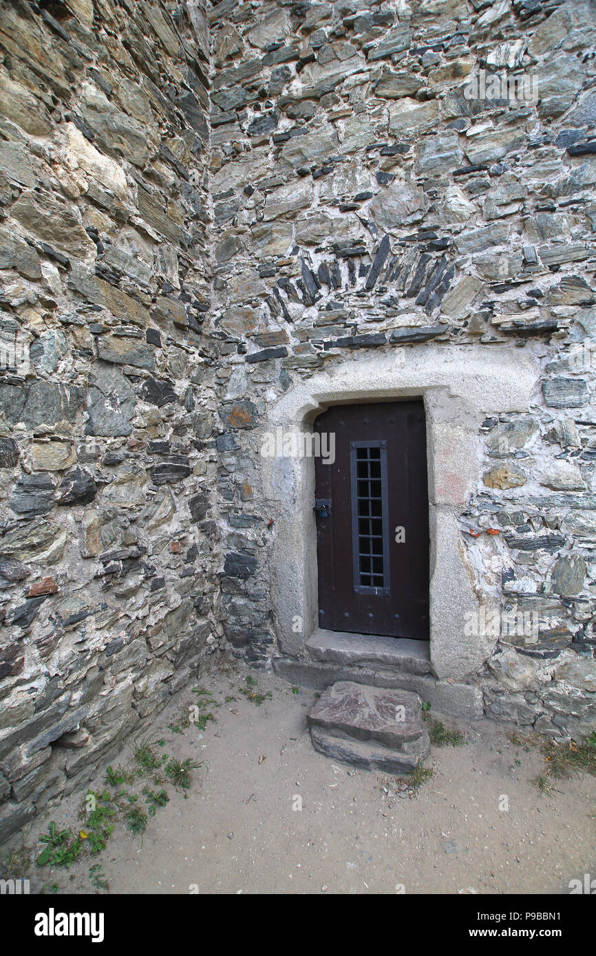 Wooden door in the ancient castle tower Stock Photo - Alamy