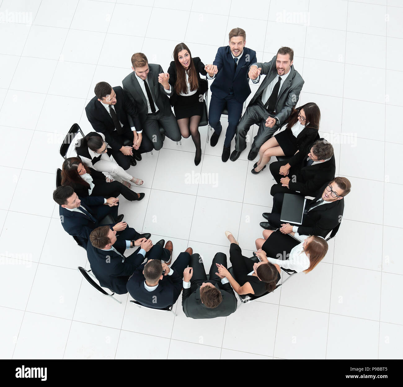 concept of team building .large successful business team sitting in a ...