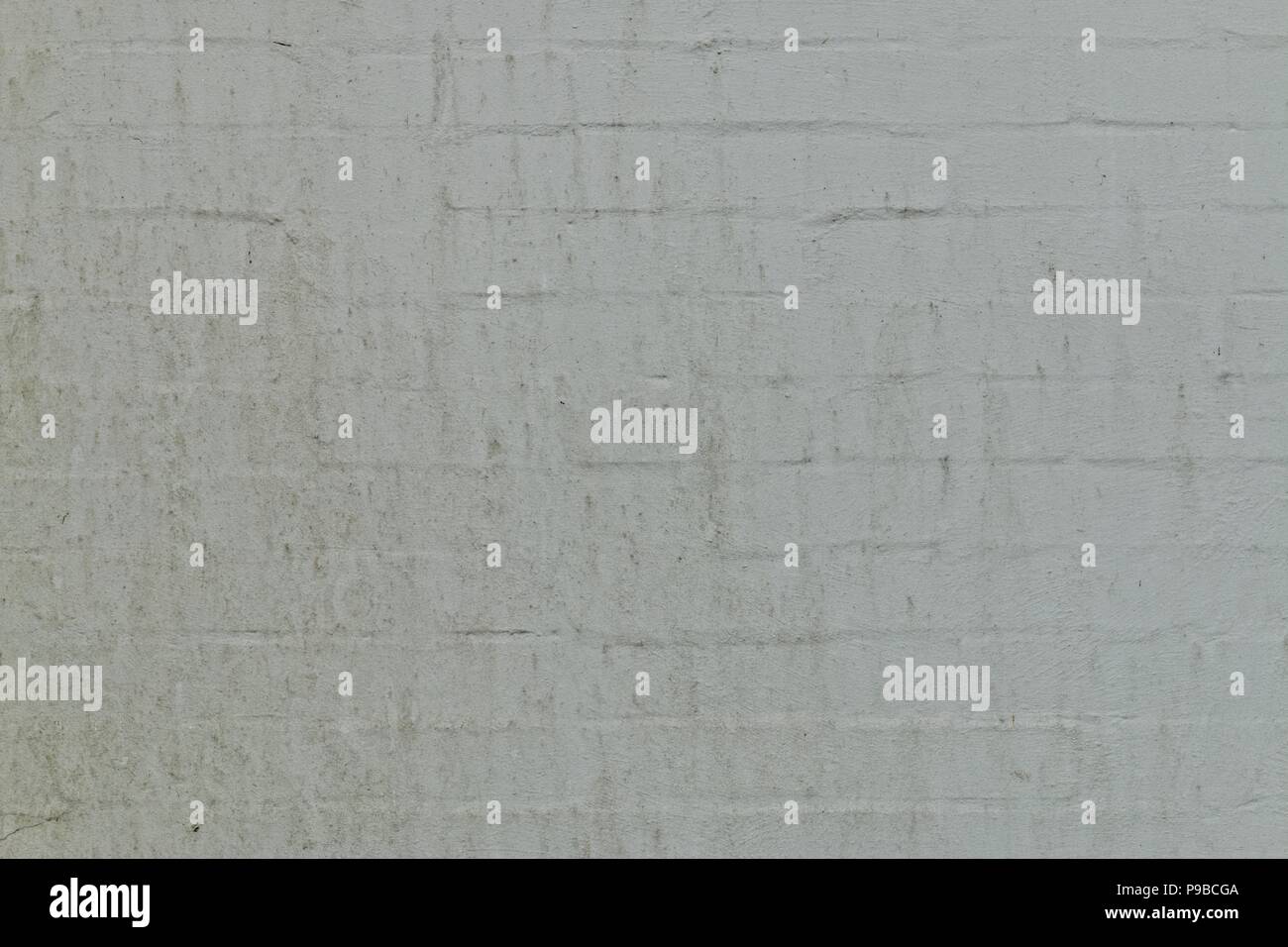Whitewashed stained brick wall Stock Photo - Alamy