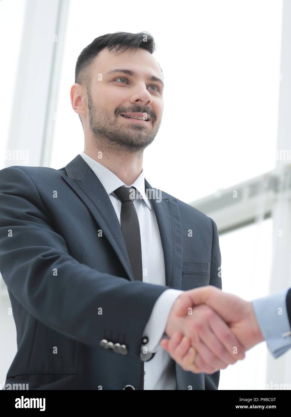 closeup. handshake business partners after bargain Stock Photo - Alamy