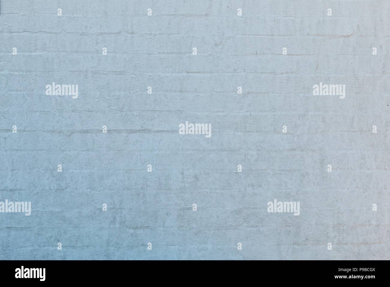 Whitewashed stained brick wall Stock Photo - Alamy