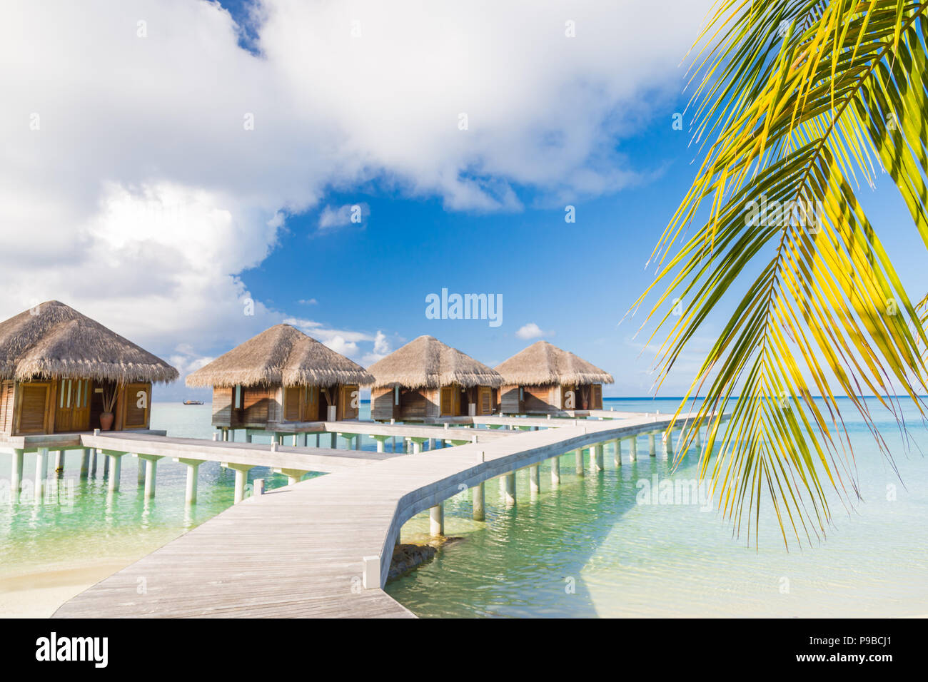 Beautiful beach scene water bungalows. Summer holiday and vacation ...
