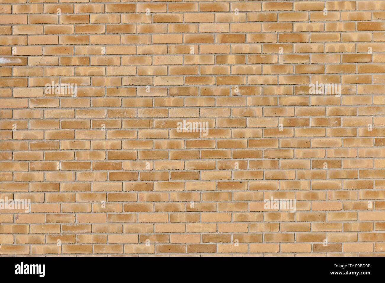 Modern brick wall light brown beige Stock Photo - Alamy