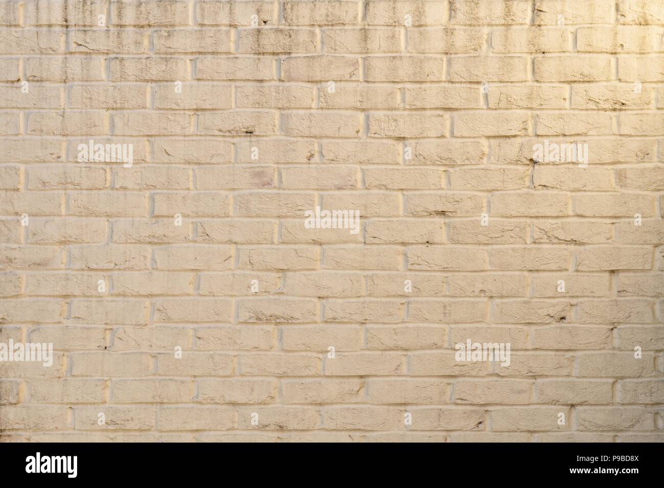 Whitewashed brick wall stained Stock Photo - Alamy