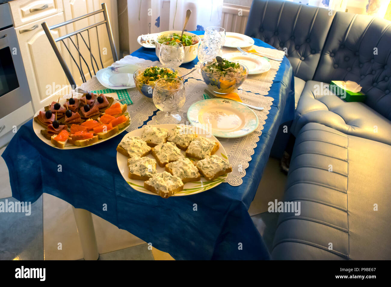 Assorted dishes on served table, setout for friendly party at home ...