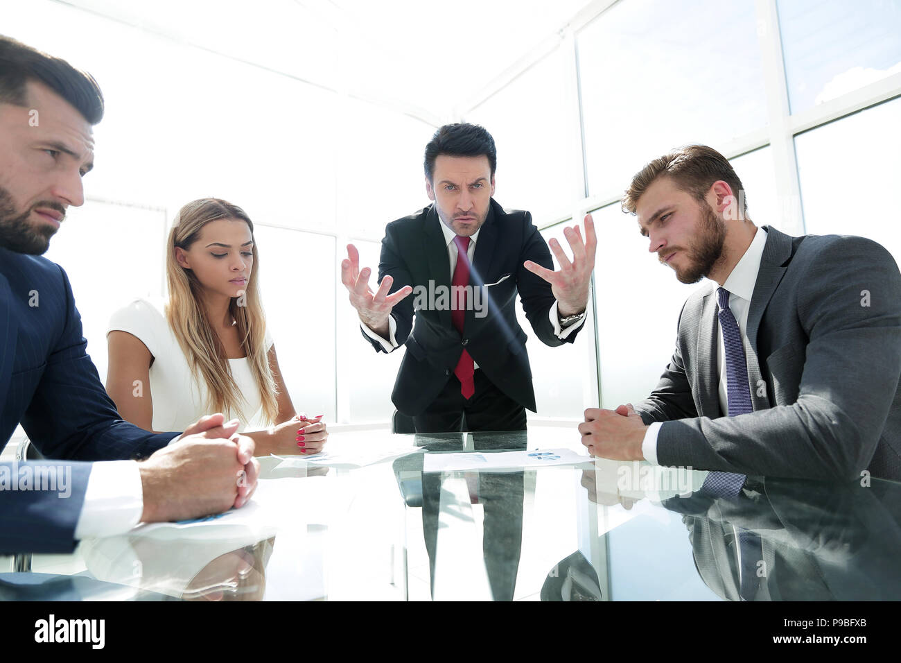 businessman makes a strict reprimand to the employee Stock Photo - Alamy