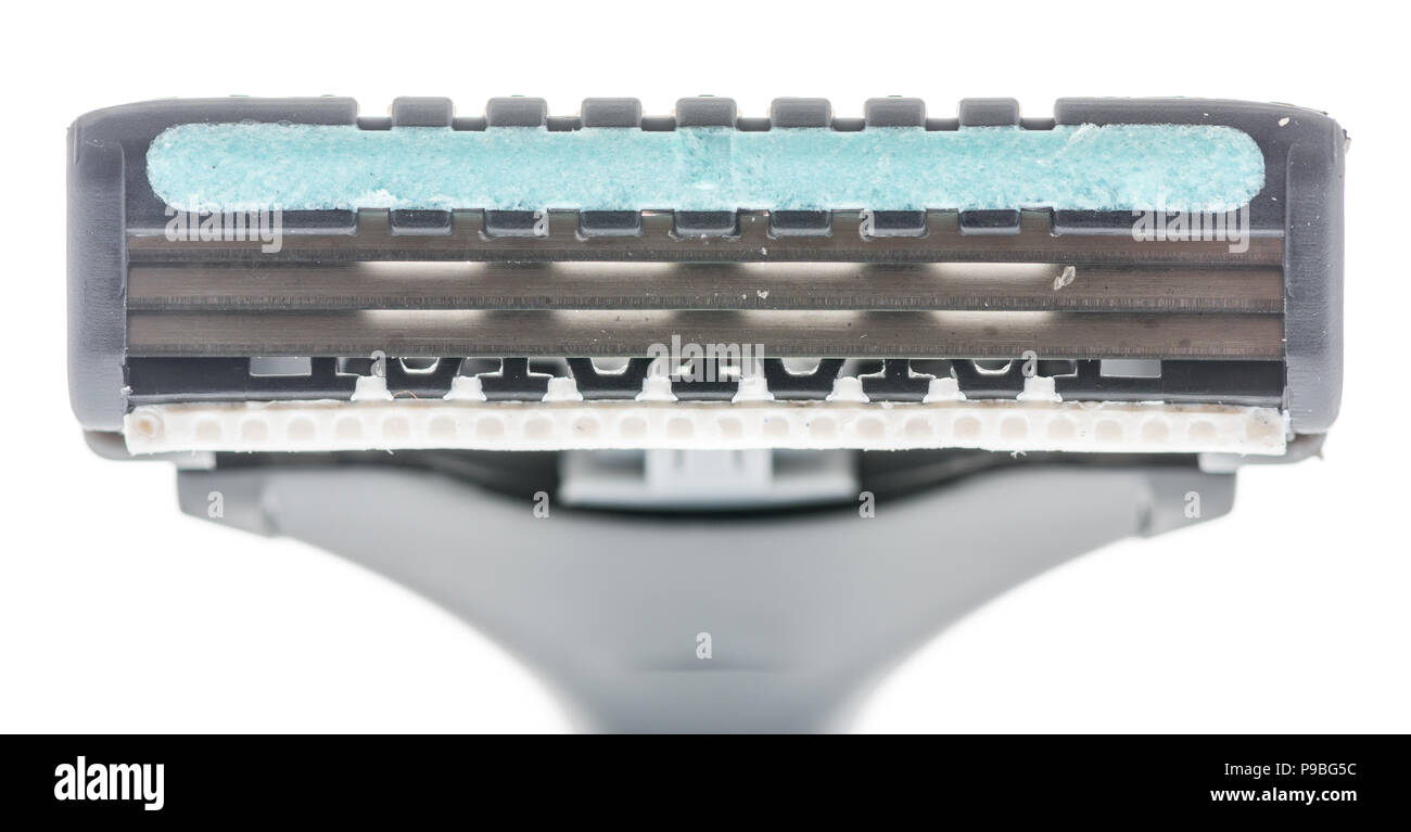 A close up image of a three bladed shaving razor Stock Photo - Alamy