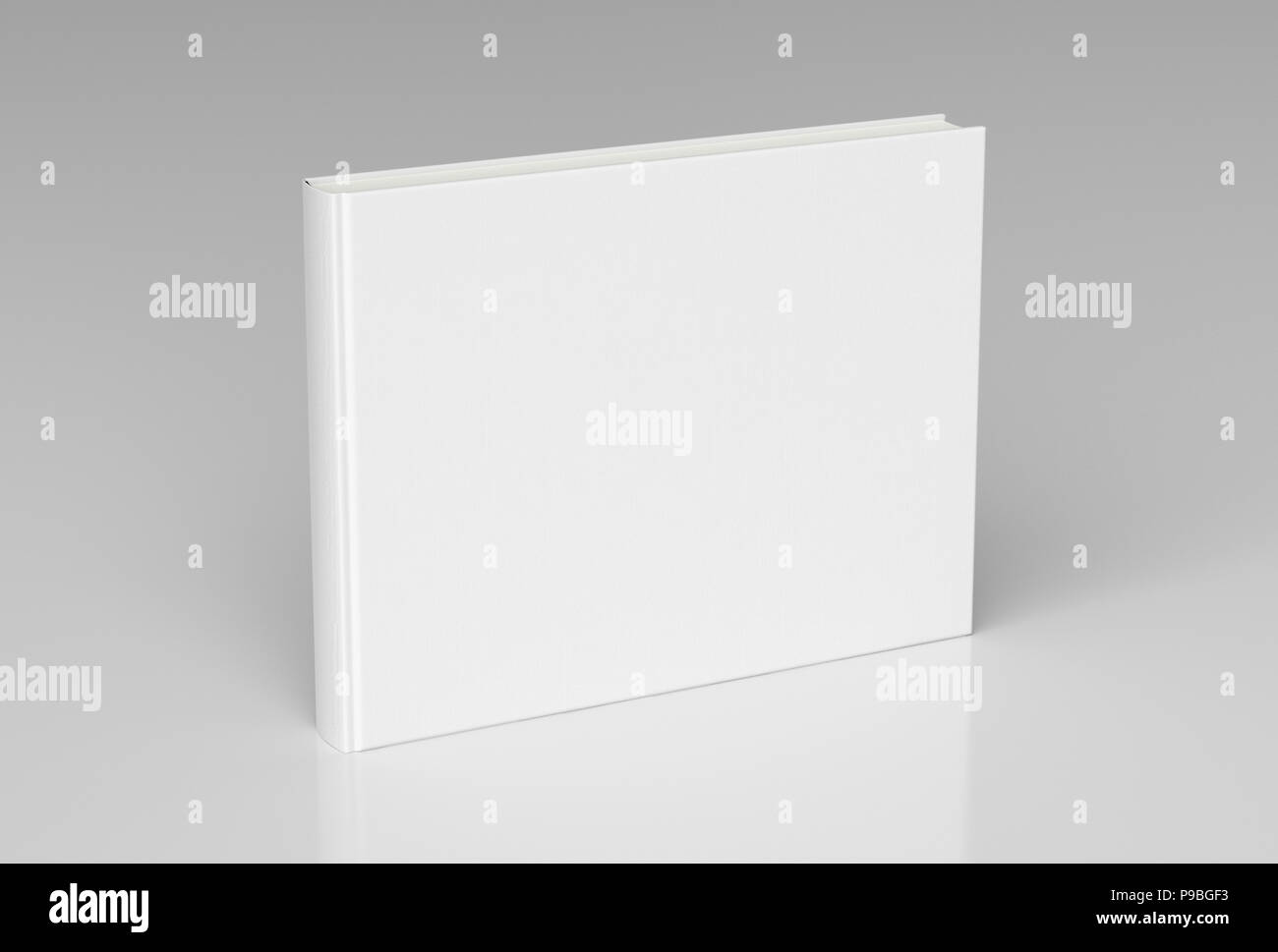 White blank book textured cover with landscape orientation standing ...