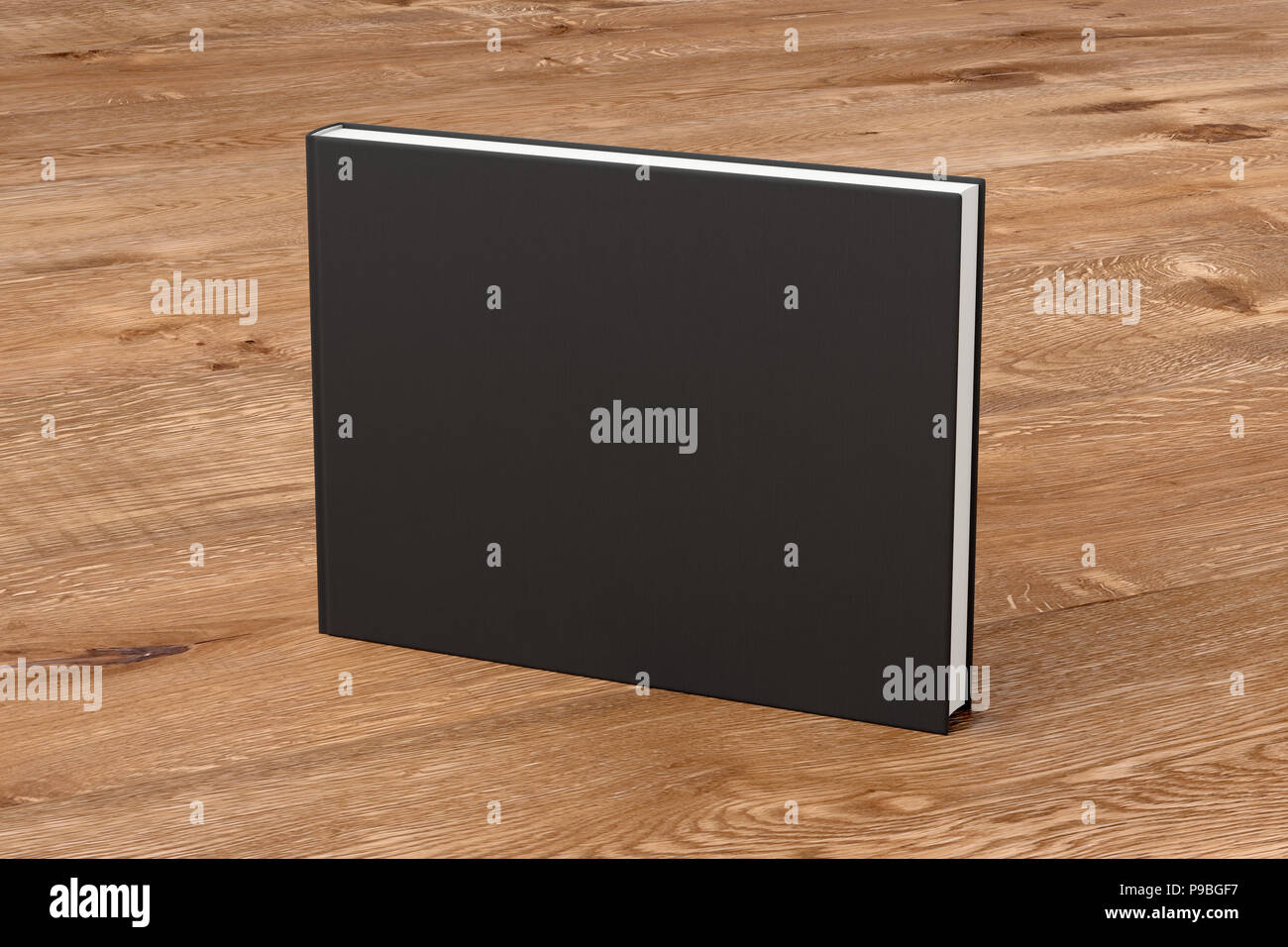 Black blank book textured cover with landscape orientation standing ...