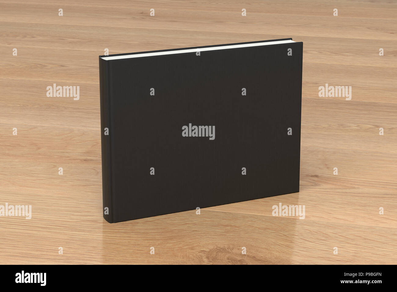 Black blank book textured cover with landscape orientation standing ...